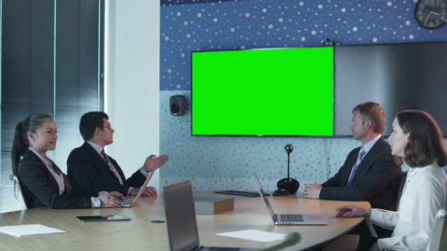 Team Meeting With Green Screen Monitor Stock Footage: Royalty-Free ...