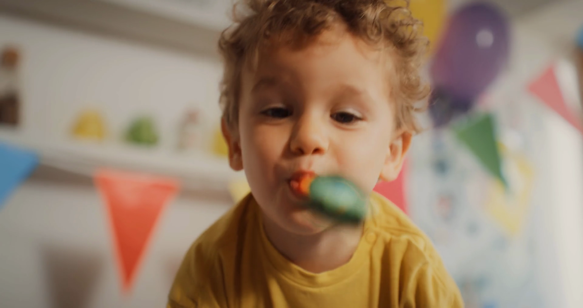 Portrait Of Male Kid Using Party Blower In Stock Footage SBV-348439563 ...