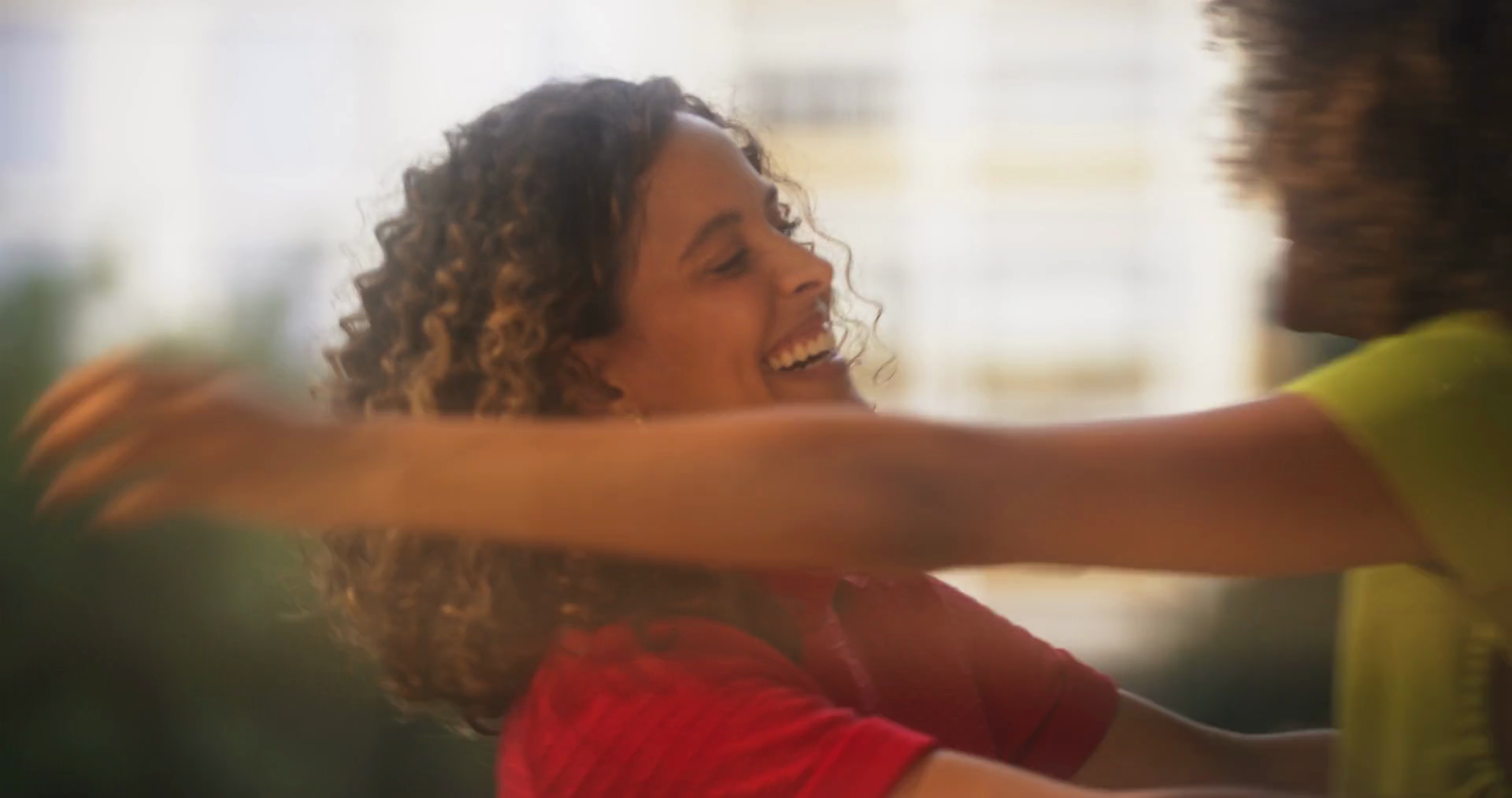 Two Women Hugging In Balcony Stock Footage SBV-348550081 - Storyblocks