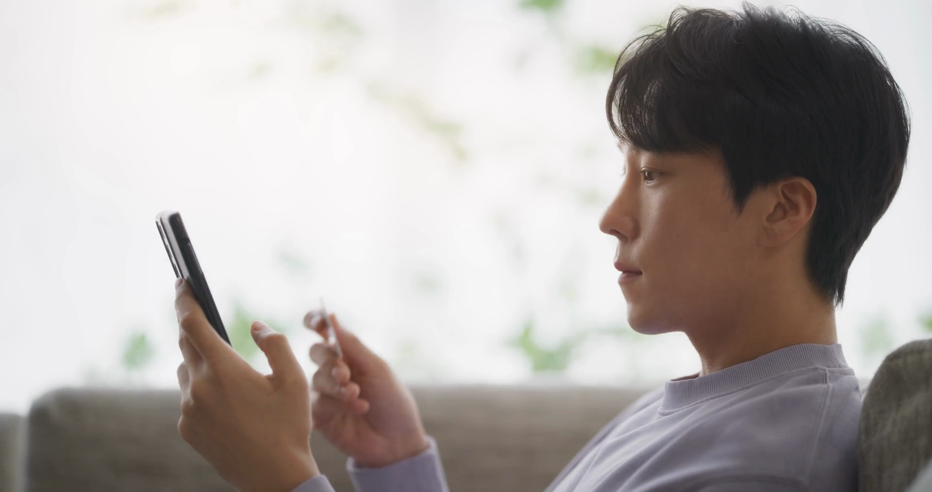Young South Korean Man Navigating Online Stock Footage SBV-348556580 ...