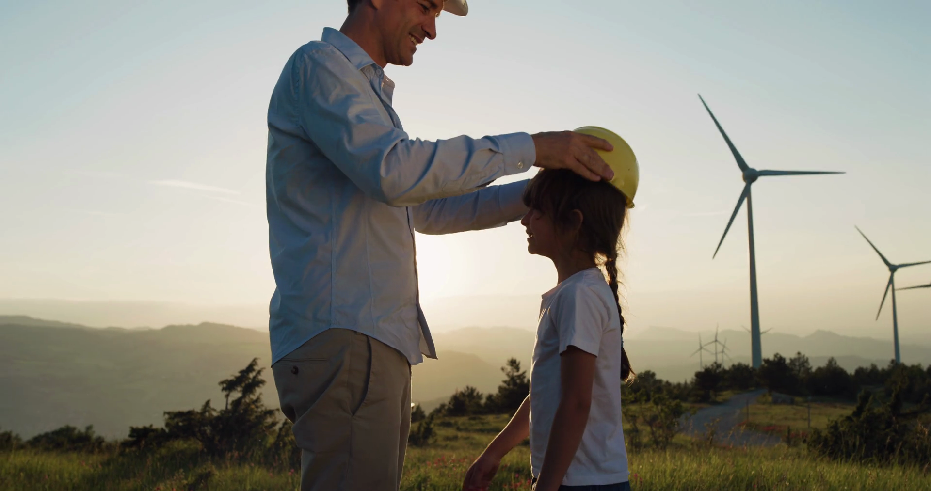 Male Engineer Daughter Hugging In Windfarm Stock Footage SBV-348479796 ...