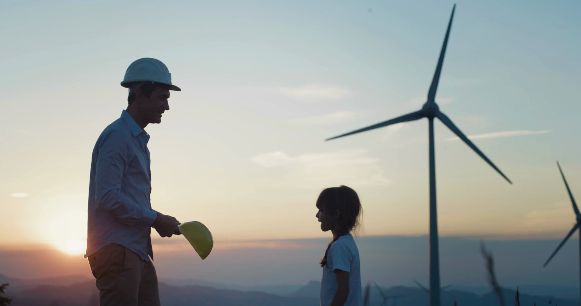 Male Engineer Daughter Hugging In Windfarm Stock Footage SBV-348479810 ...
