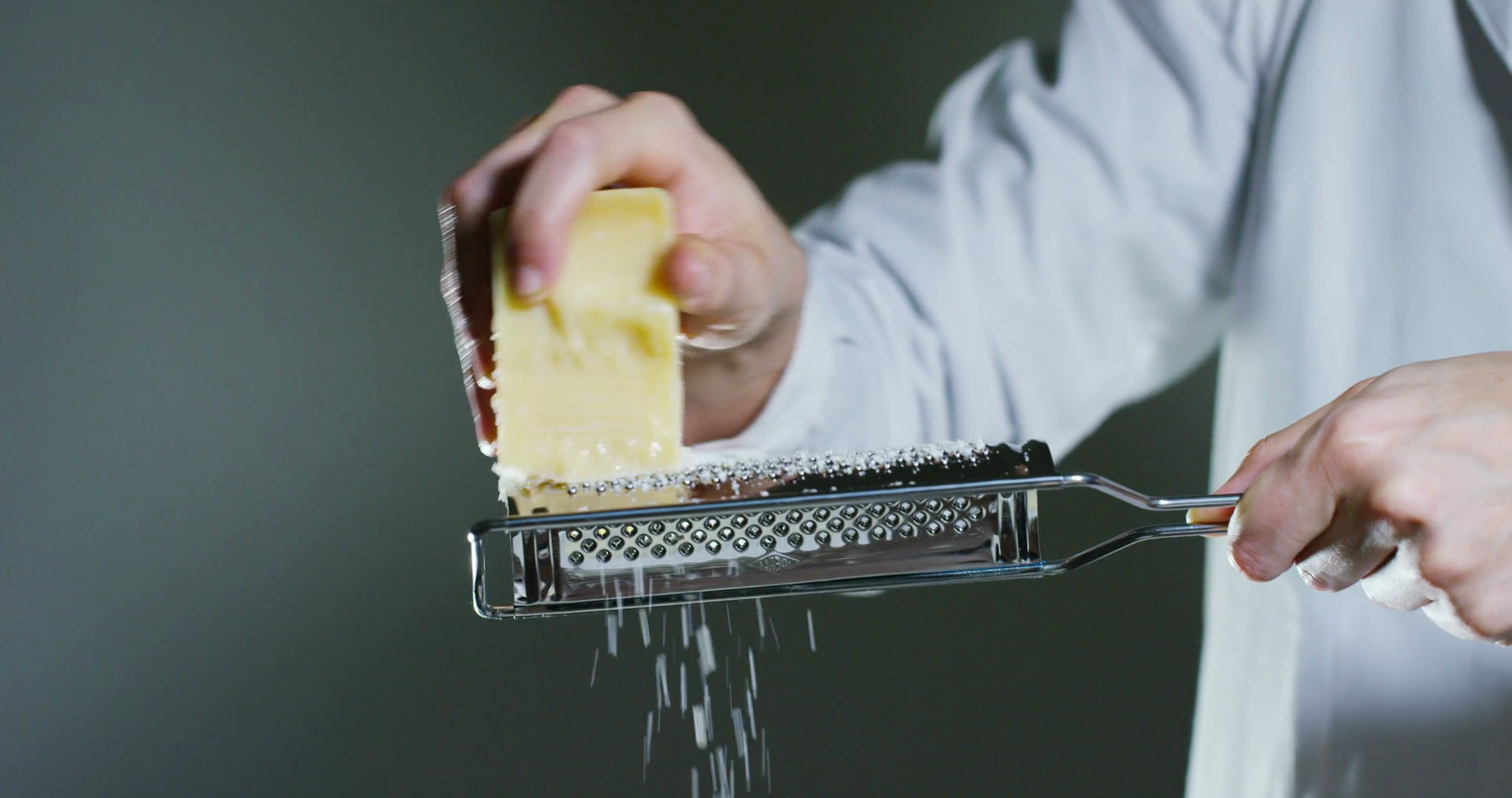 Slow Motion Of Cook Grater Parmesan Cheese Stock Footage SBV-348700103 ...