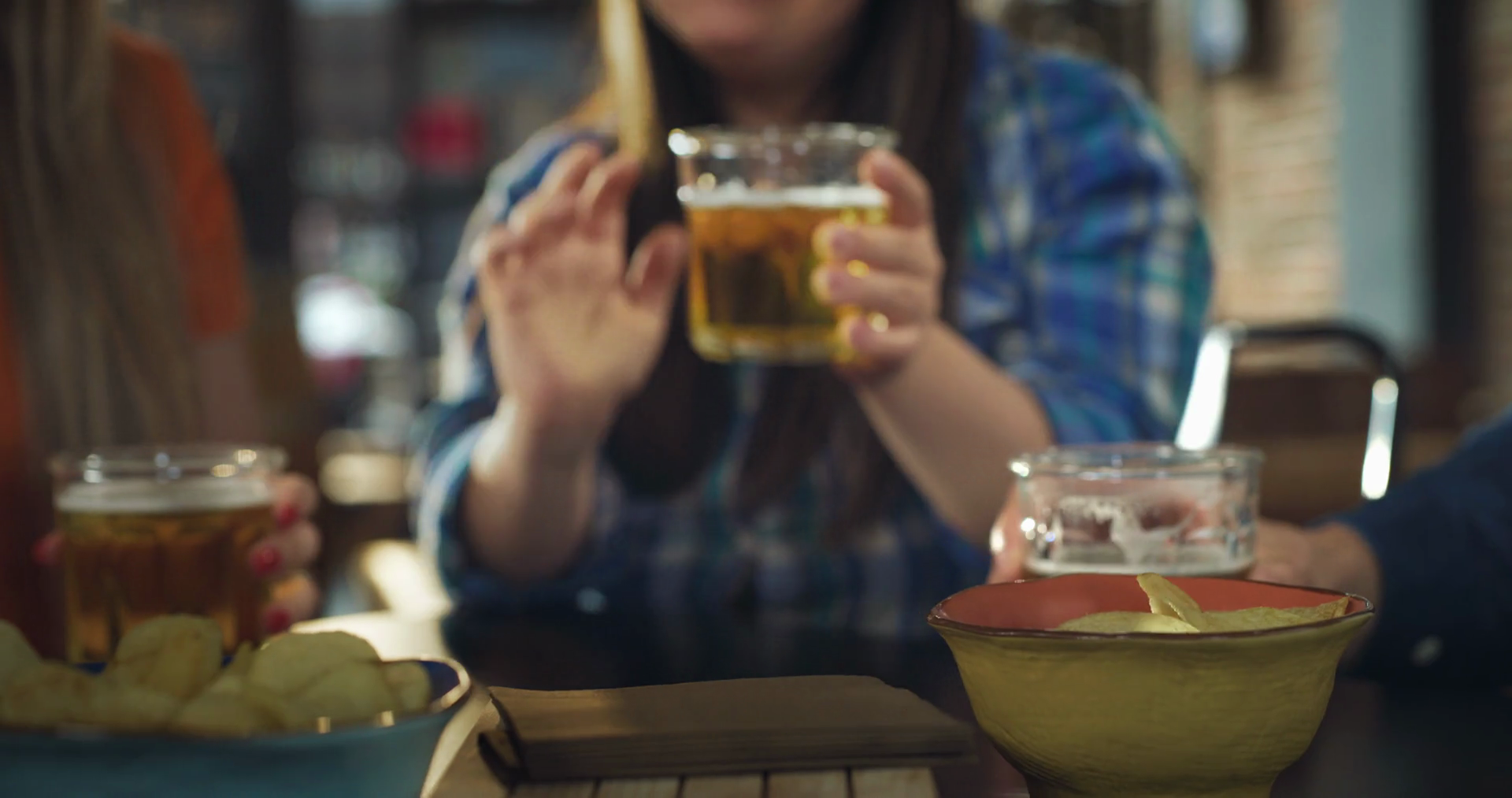 Close Up On Clinking Glasses With Beers Held Stock Footage SBV ...