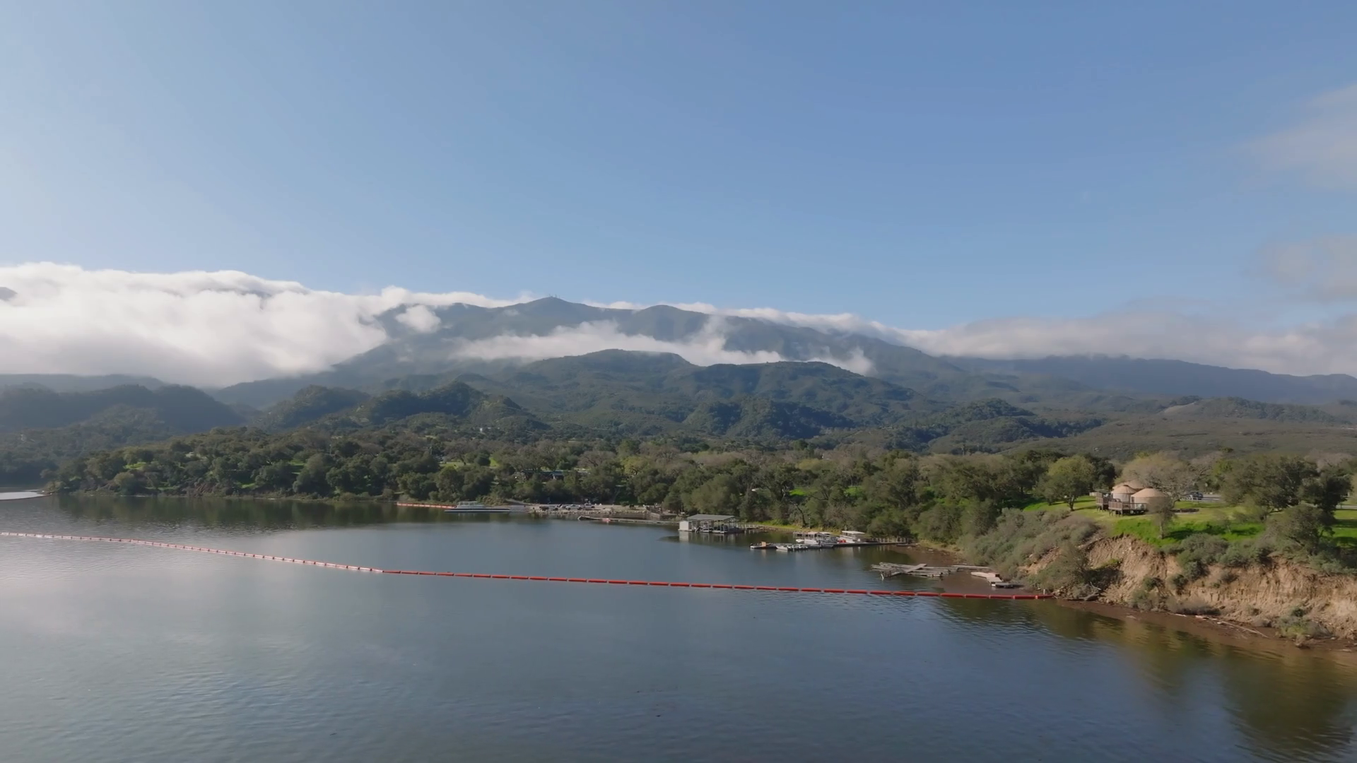 Aerial Slide Pan Of Marina At Bank Of Lake Stock Footage SBV-348487833 ...