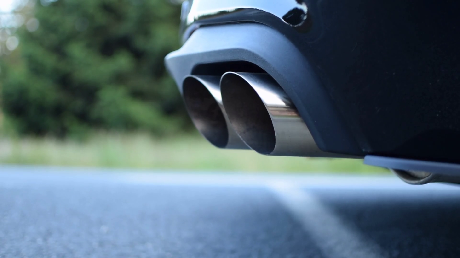 Car Exhaust Close Up On Asphalt Road With Stock Footage SBV-347712808 ...