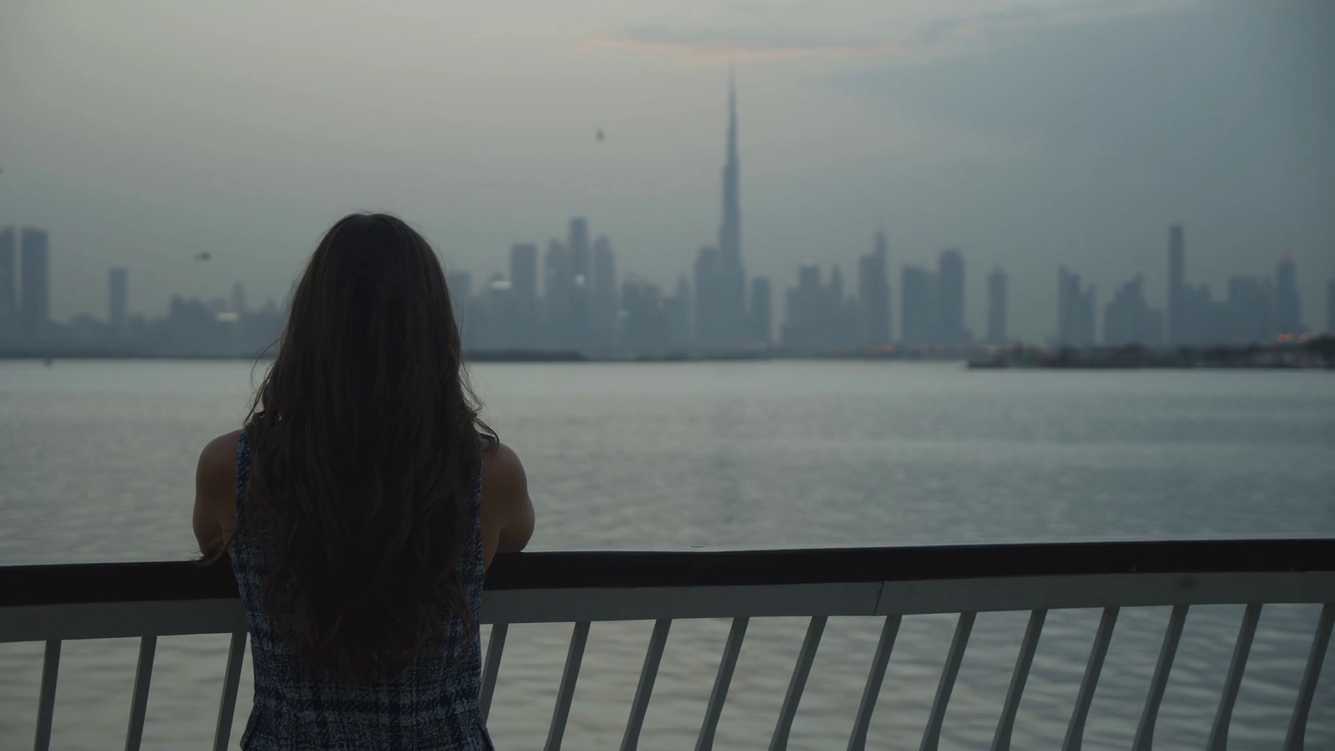 Enjoying Dubai Cityscape At Dusk: Woman Stock Footage SBV-347712507 ...