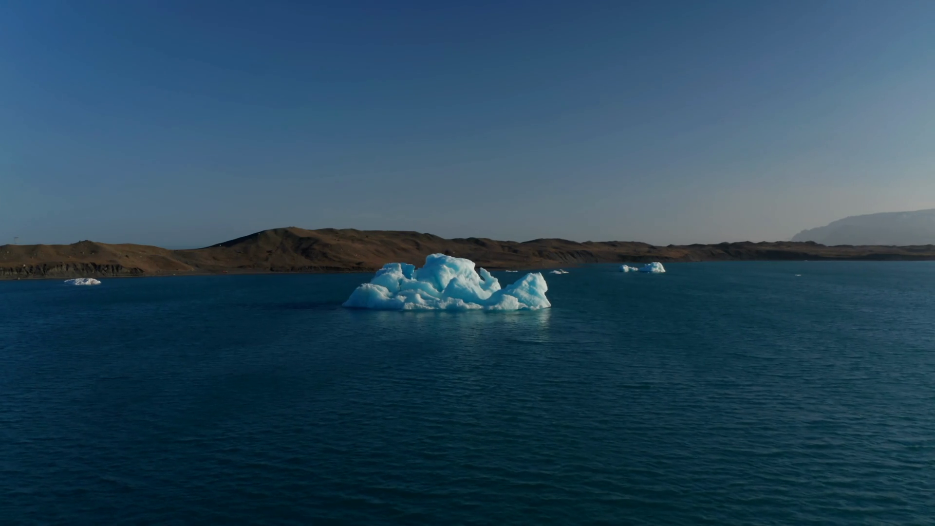 Birds Eye Drone Orbiting Around Iceberg Stock Footage SBV-347677311 ...