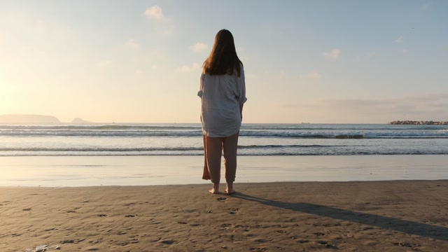 Beach Woman Watching Stock Footage: Royalty-Free Video Clips - Storyblocks