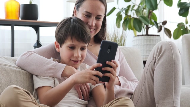 Parent Talking With Child With Device Stock Footage: Royalty-Free Video ...