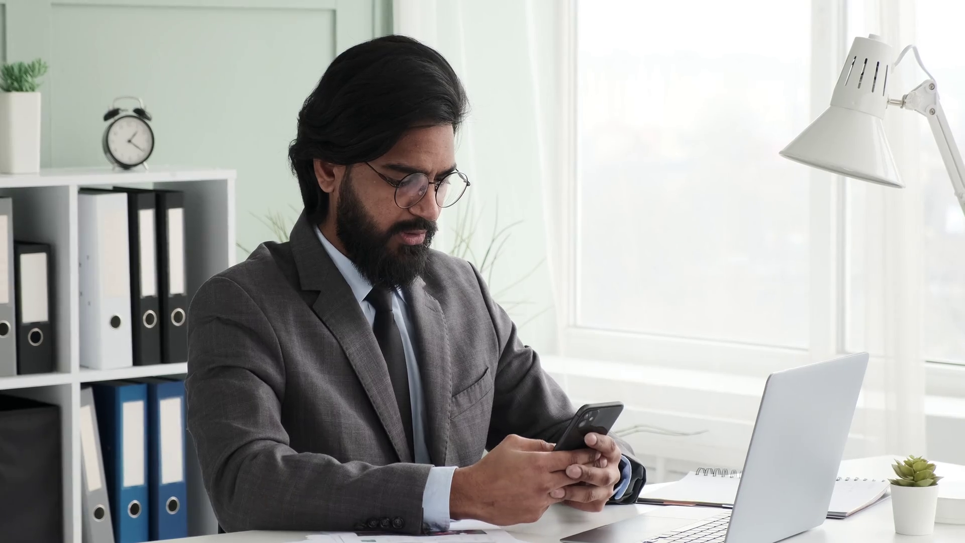 Businessman Messaging On Phone At Workplace Stock Footage SBV-347661661 ...