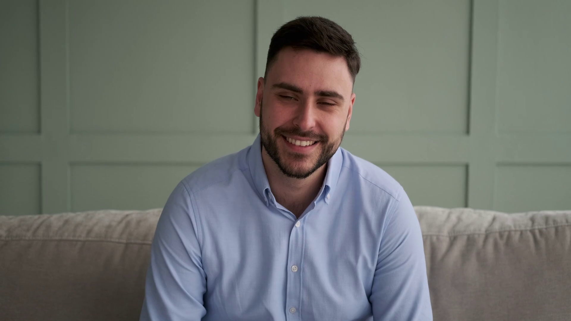Man Sitting On Sofa Smiling Feeling Relaxed Stock Footage SBV-347656933 ...