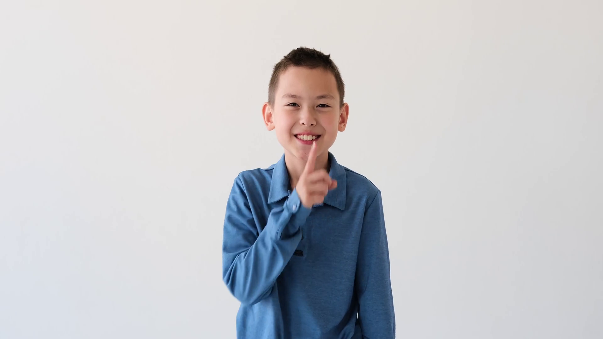 Playful Asian Boy Secretly Signals Shhh With Stock Footage SBV ...