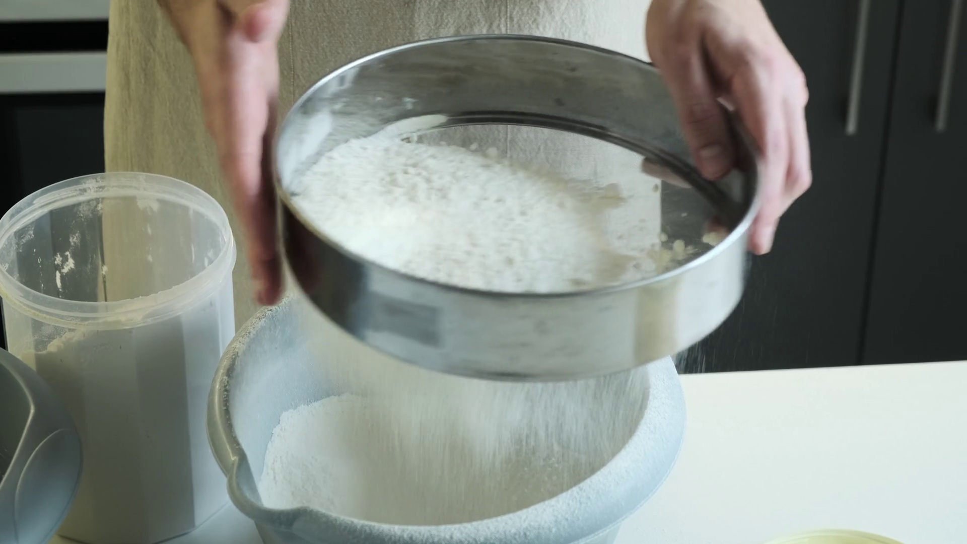 Man Sifting Flour Through Sieve In Kitchen Stock Footage SBV-347796462 ...