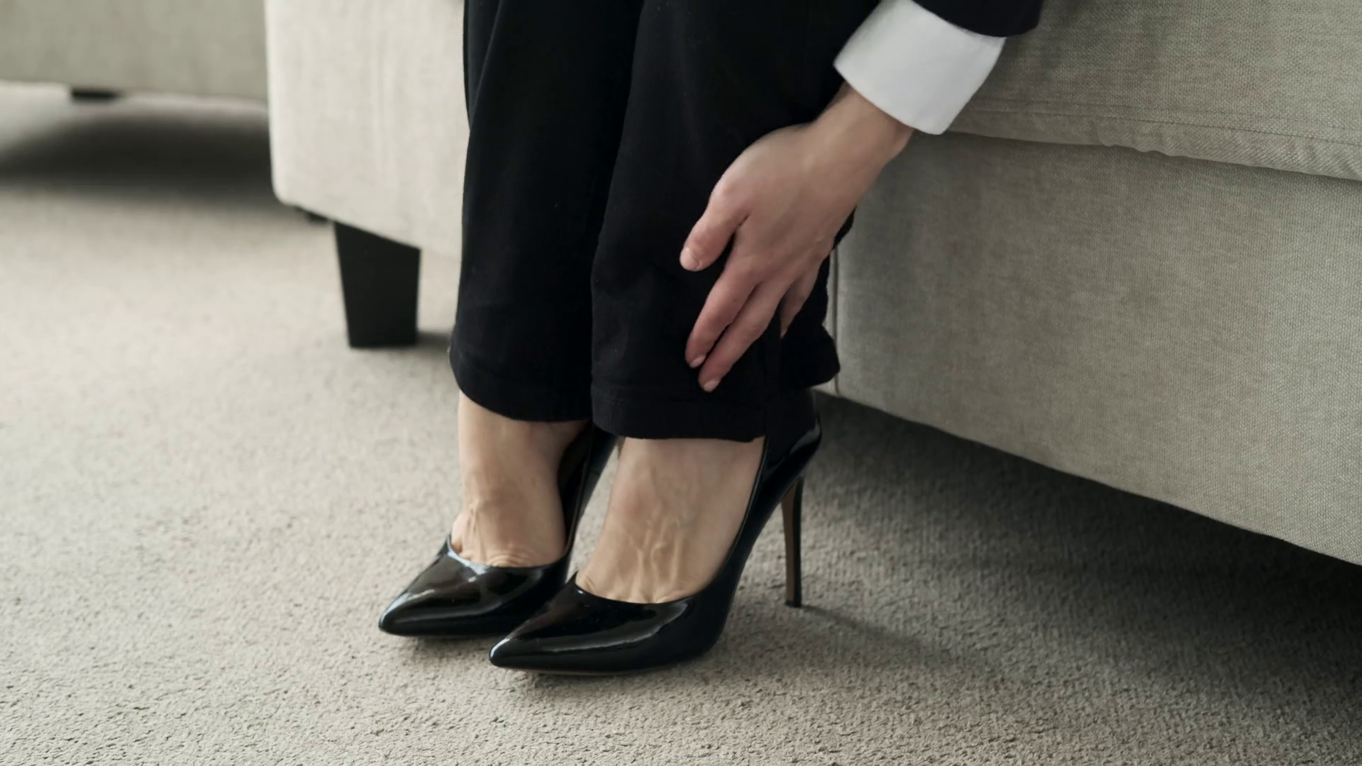 Close-up Of Tired Woman Removing High Heels Stock Footage SBV-347810073 ...