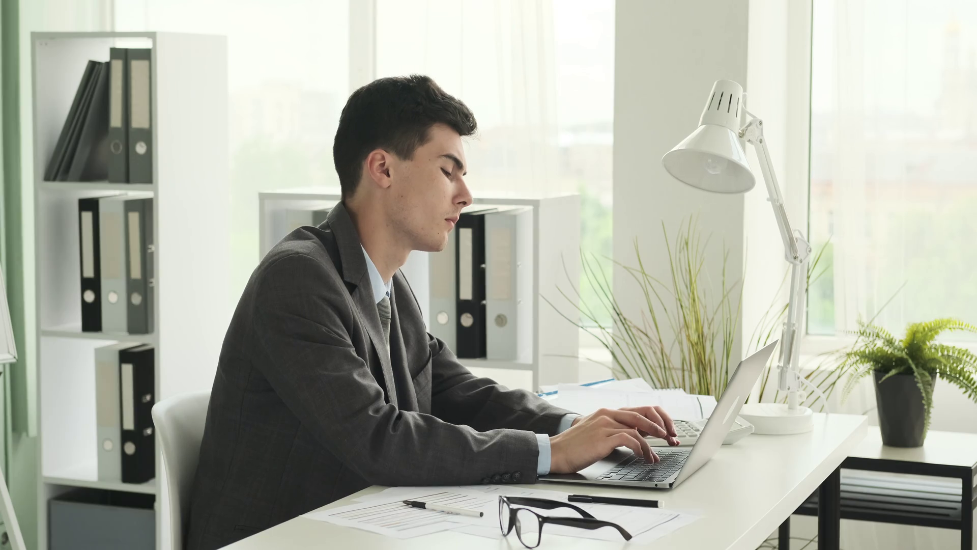 Focused Office Worker Typing On Laptop In Stock Footage SBV-348388707 ...
