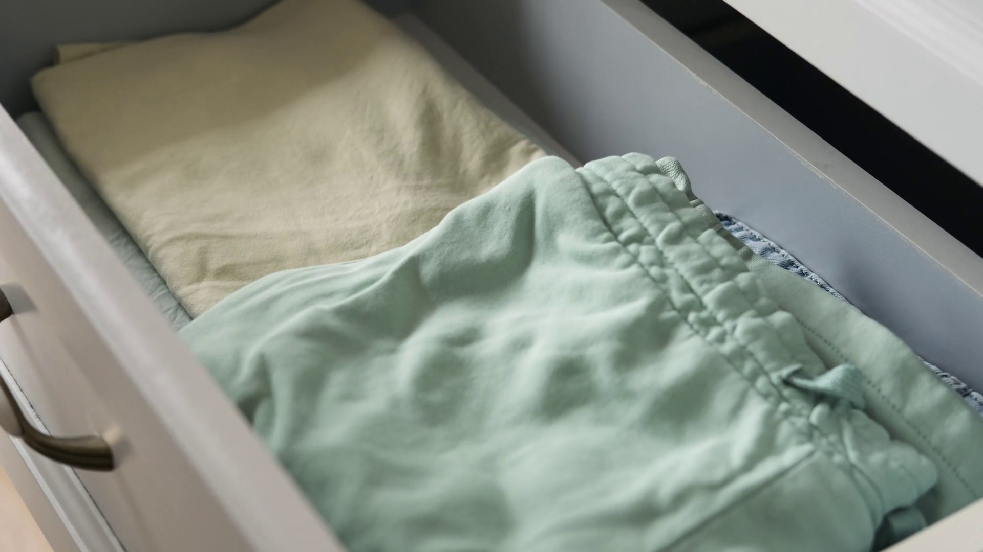 Hands Folding Clothes Into Drawer Stock Footage SBV-348495886 - Storyblocks