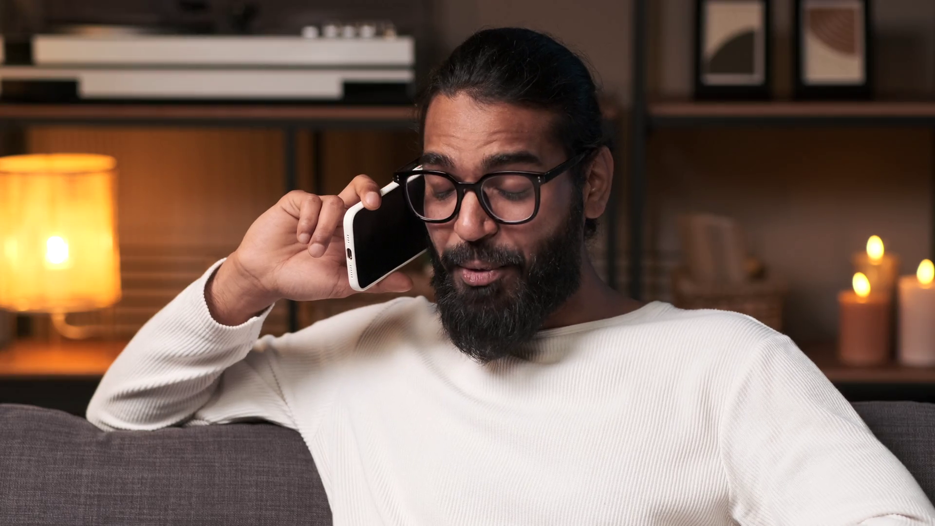 Positive Indian Man Talking On Phone On Sofa Stock Footage SBV ...