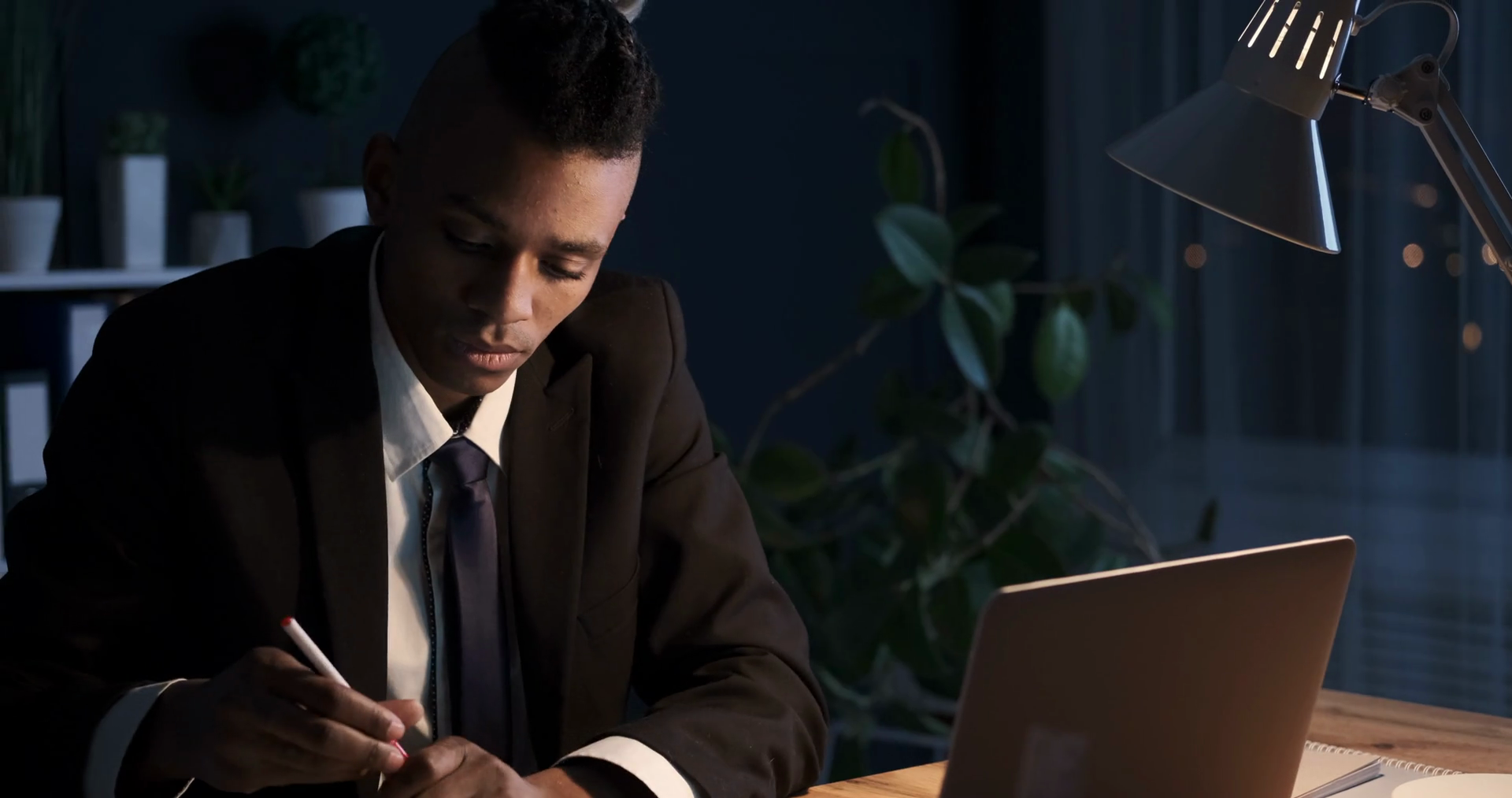 Businessman Using Laptop Taking Notes At Stock Footage SBV-334705897 ...