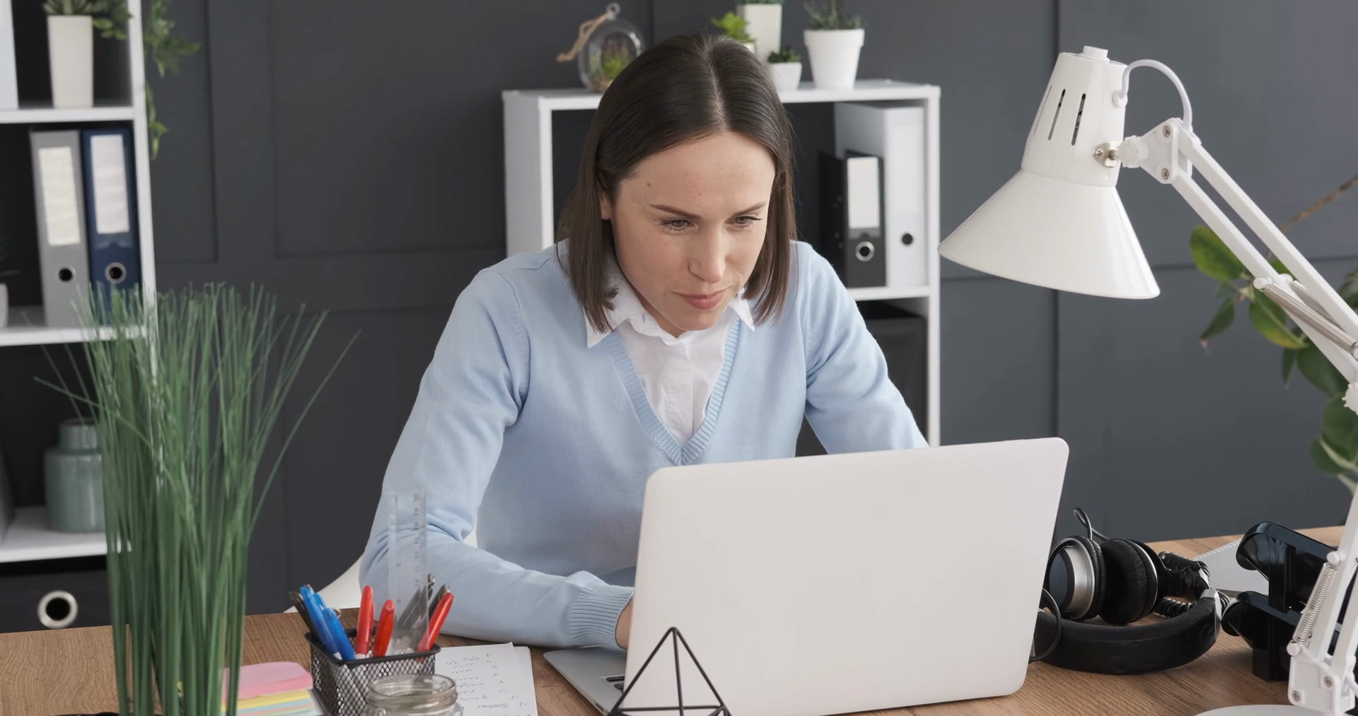 Businesswoman reading an email from laptop Stock Video Footage ...