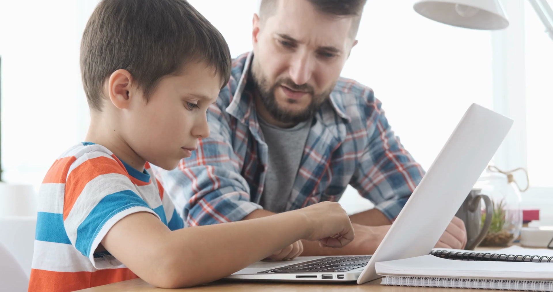 Father Guiding Son To Use Laptop Stock Footage SBV-335493425 - Storyblocks