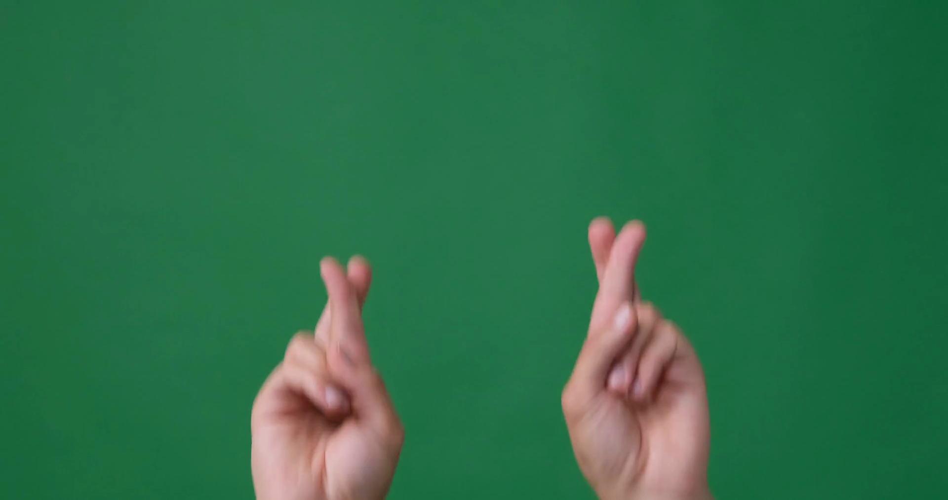 Hands With Fingers Crossed Over Green Screen Stock Footage SBV ...