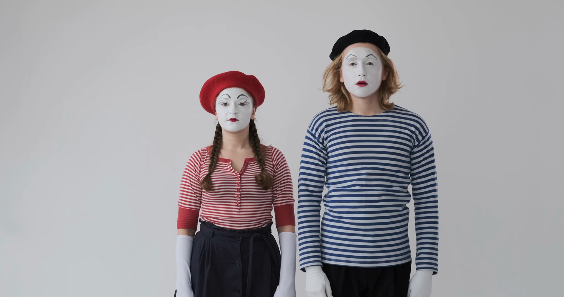 Two mime artist gesturing with finger on lips Stock Video Footage 00:09 ...