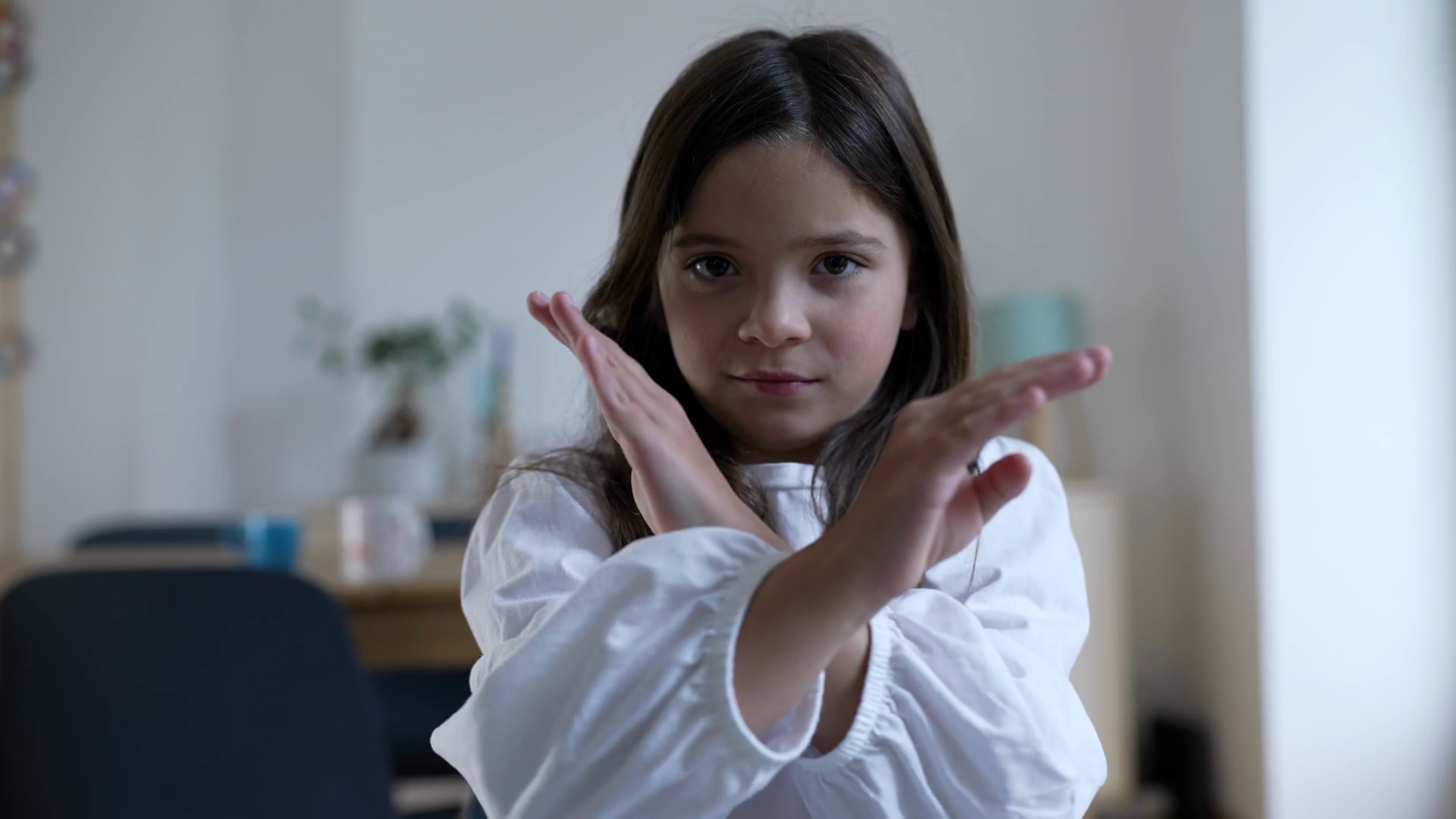 Child Gesturing With Arms Crossed In X Shape Stock Footage SBV ...
