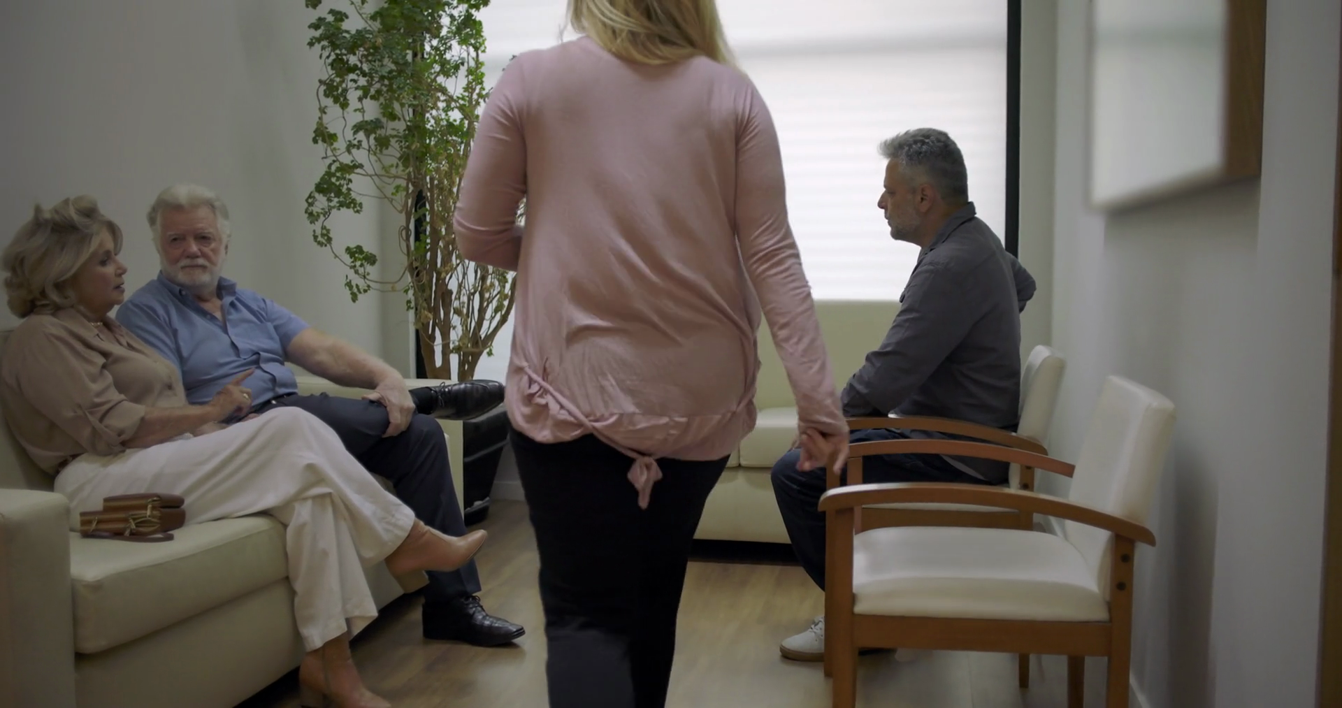 Woman Walking Through Clinic Waiting Area Stock Footage SBV-352022889 ...