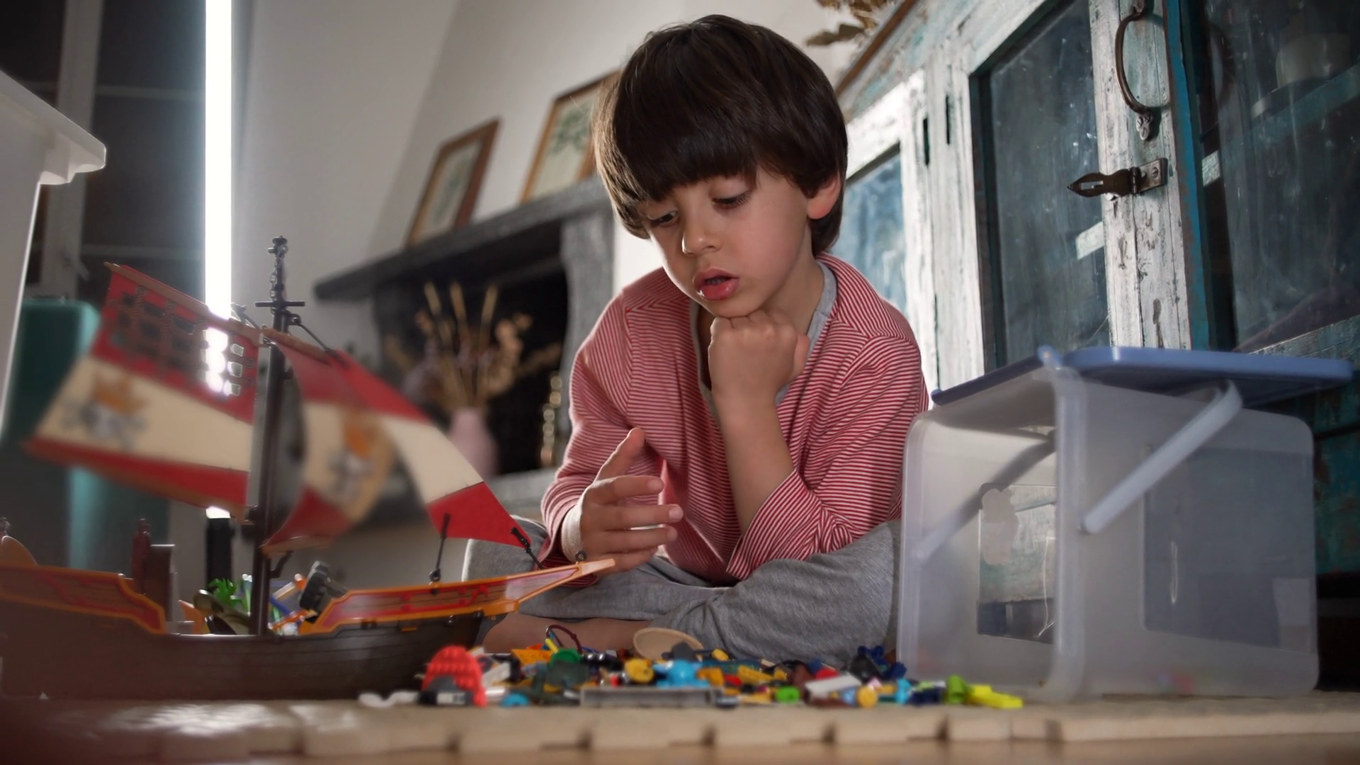 Boy Leaning Forward Searching Inside Toy Box Stock Footage SBV ...