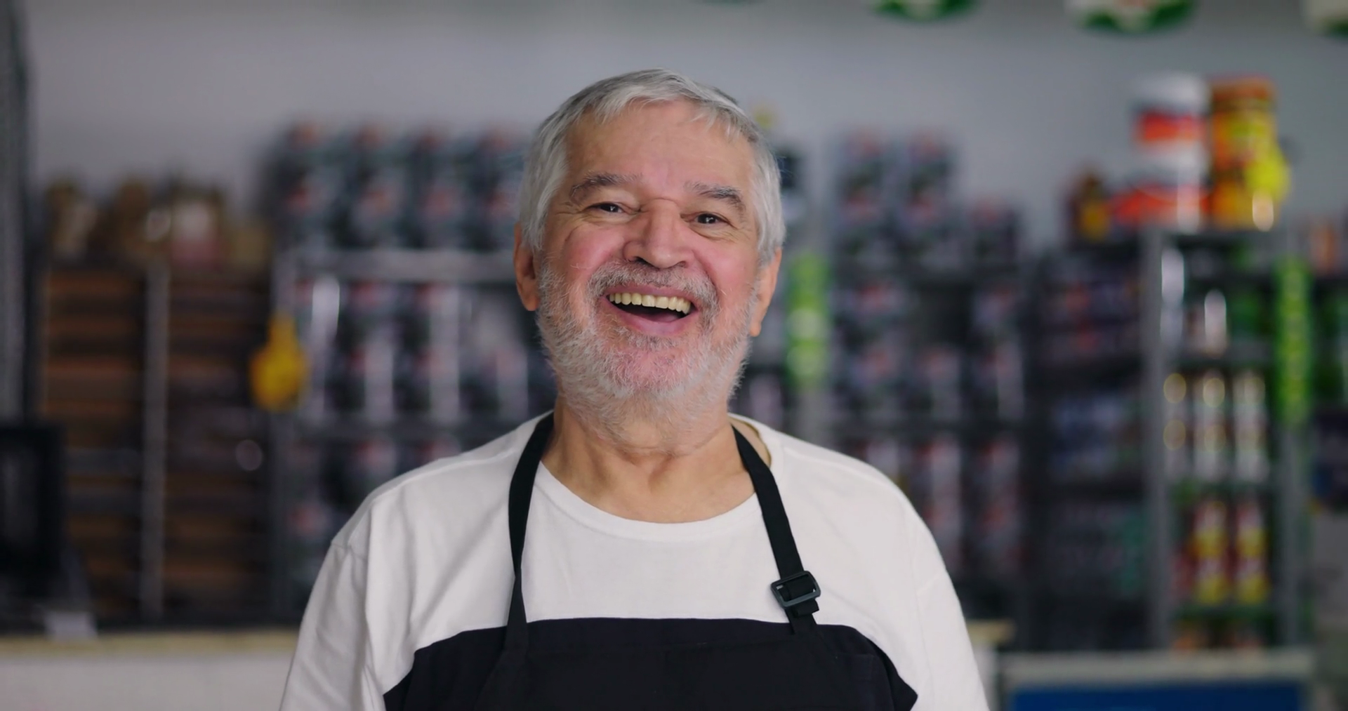Elderly Shopkeeper With Gray Hair Wearing Stock Footage SBV-353032469 ...