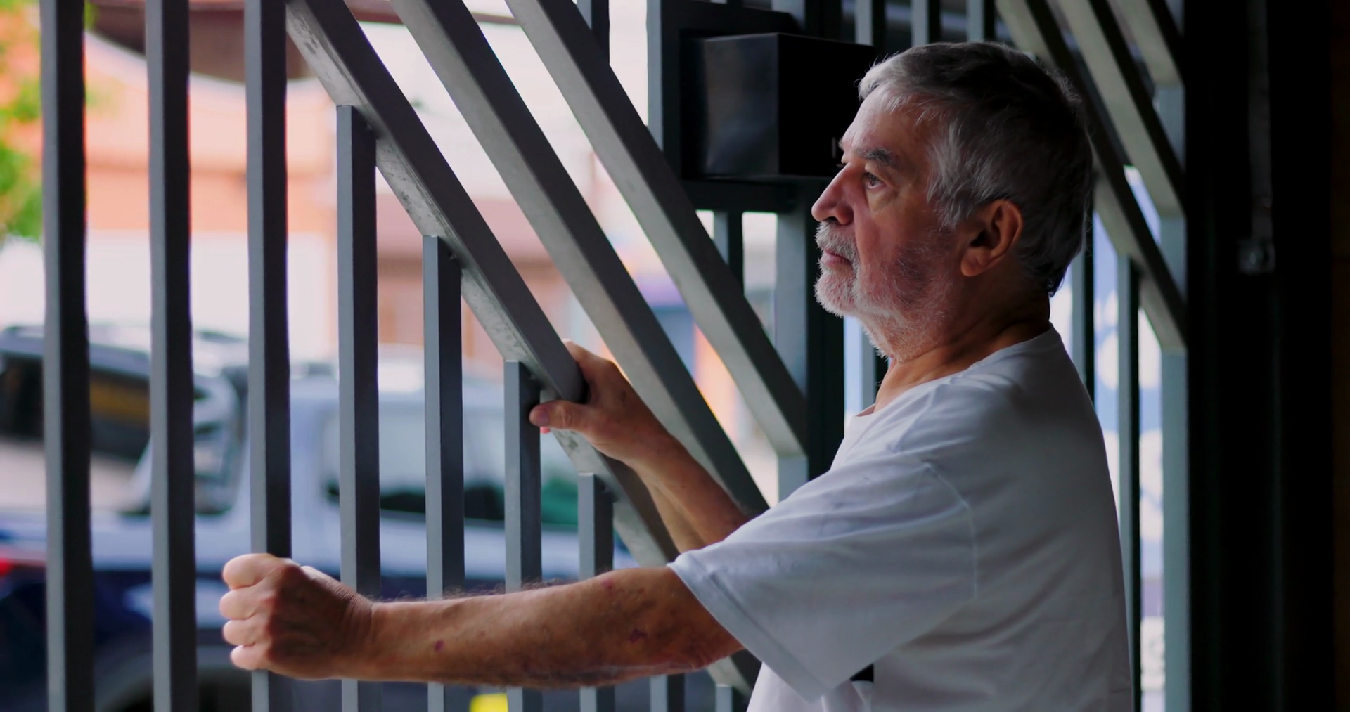 Elderly Man Standing Behind Metal Bars Stock Footage SBV-353046460 ...