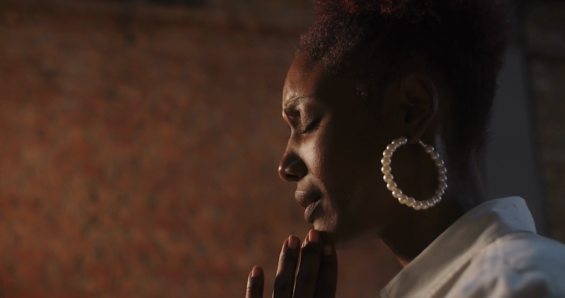 Side Profile Of Young Black Woman Praying Stock Footage SBV-351819901 ...