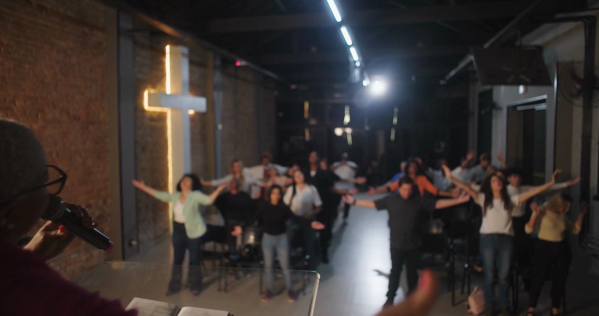 Speaker Leading Congregation In Worship Arms Stock Footage SBV ...