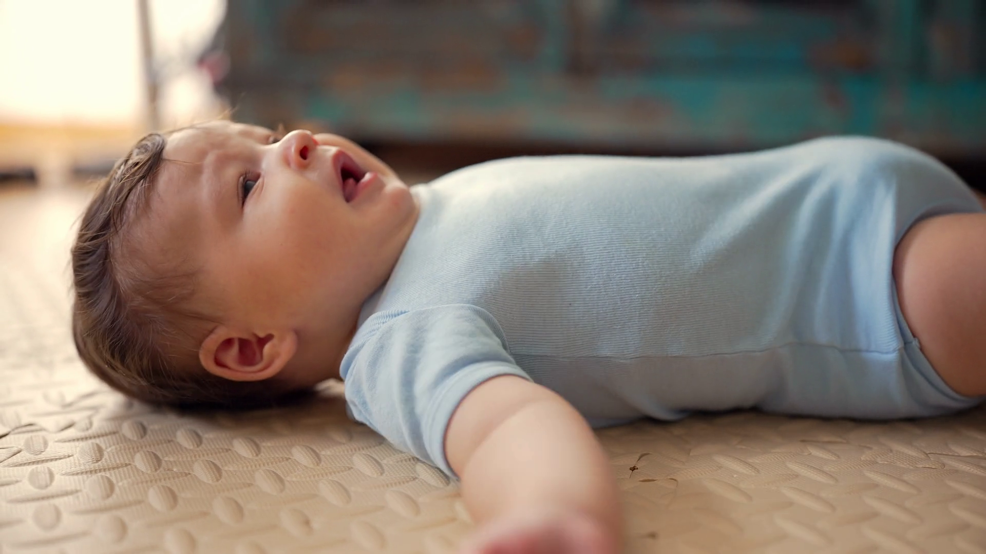 Baby Lying On Soft Mat Sneezing Natural Stock Footage SBV-351973373 ...