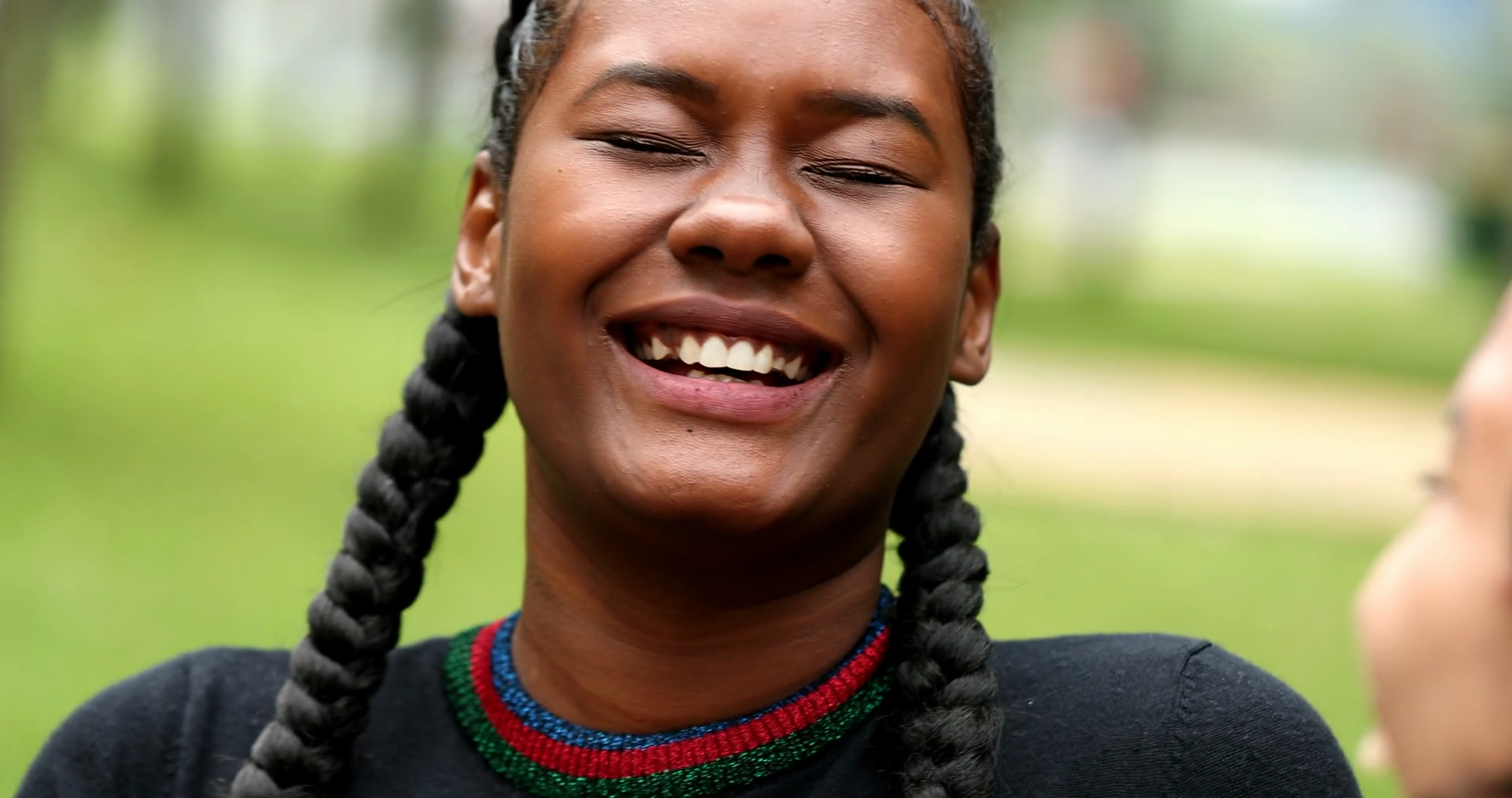 African Girl Laughing In Park With Friend Stock Footage SBV-348488775 ...