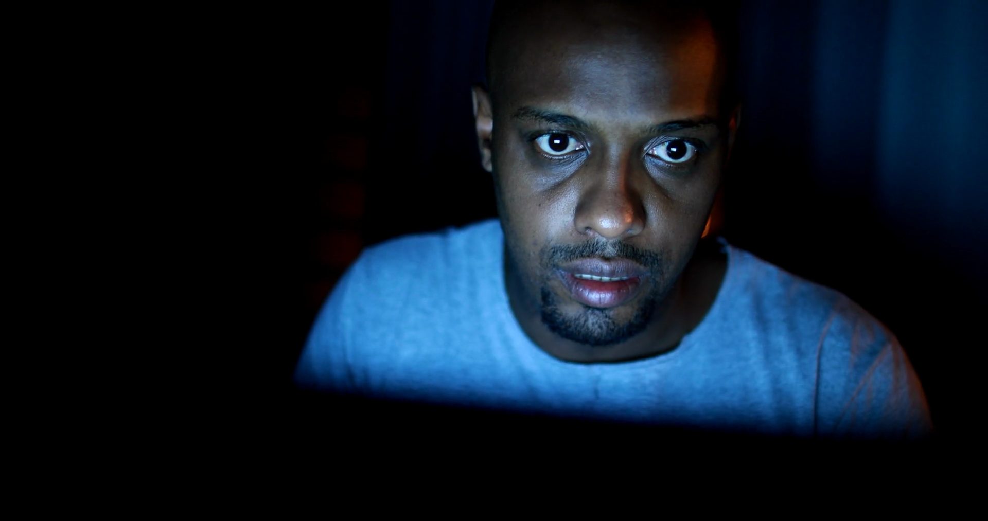 African Man Browsing Internet At Night In Stock Footage SBV-348847789 ...
