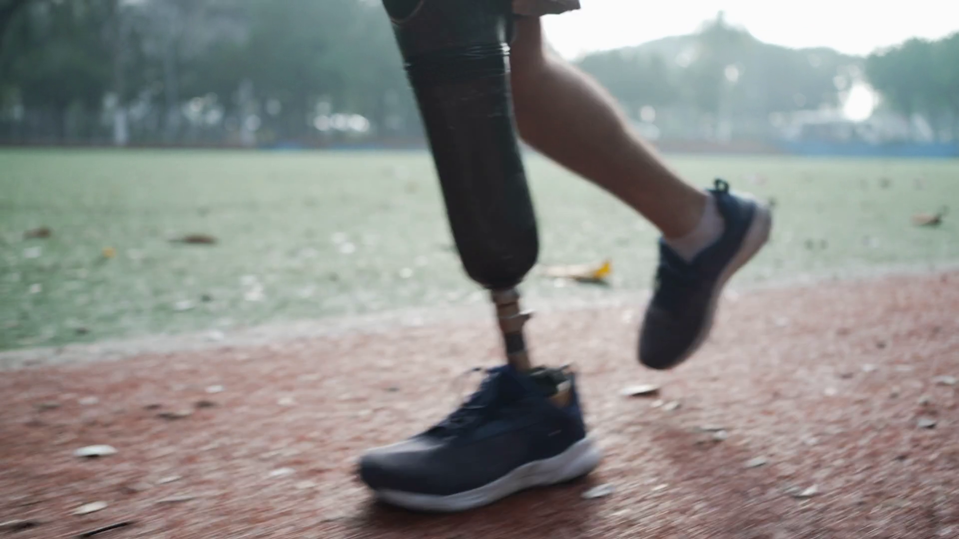 Resilient Stride: Amputee Athlete Runs With Stock Footage SBV-348404516 ...