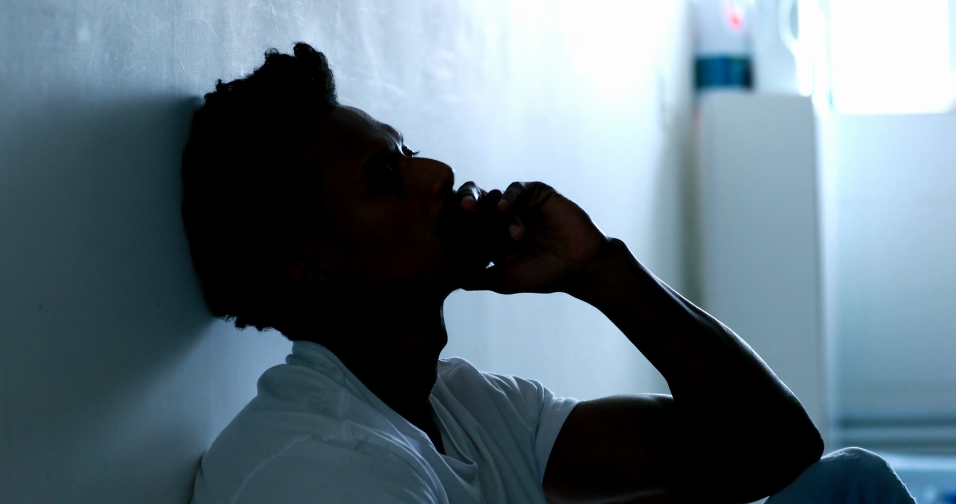 Distressed Black Man Seated On Floor Stock Footage SBV-348463909 ...