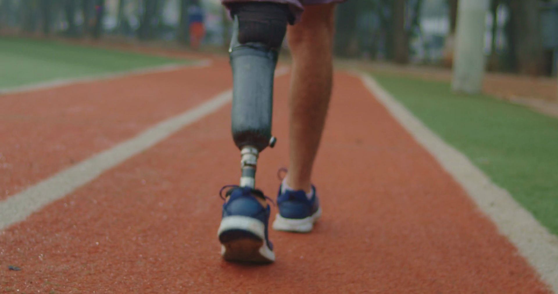 Back View Of Person With Prosthetic Leg Stock Footage SBV-348412273 ...