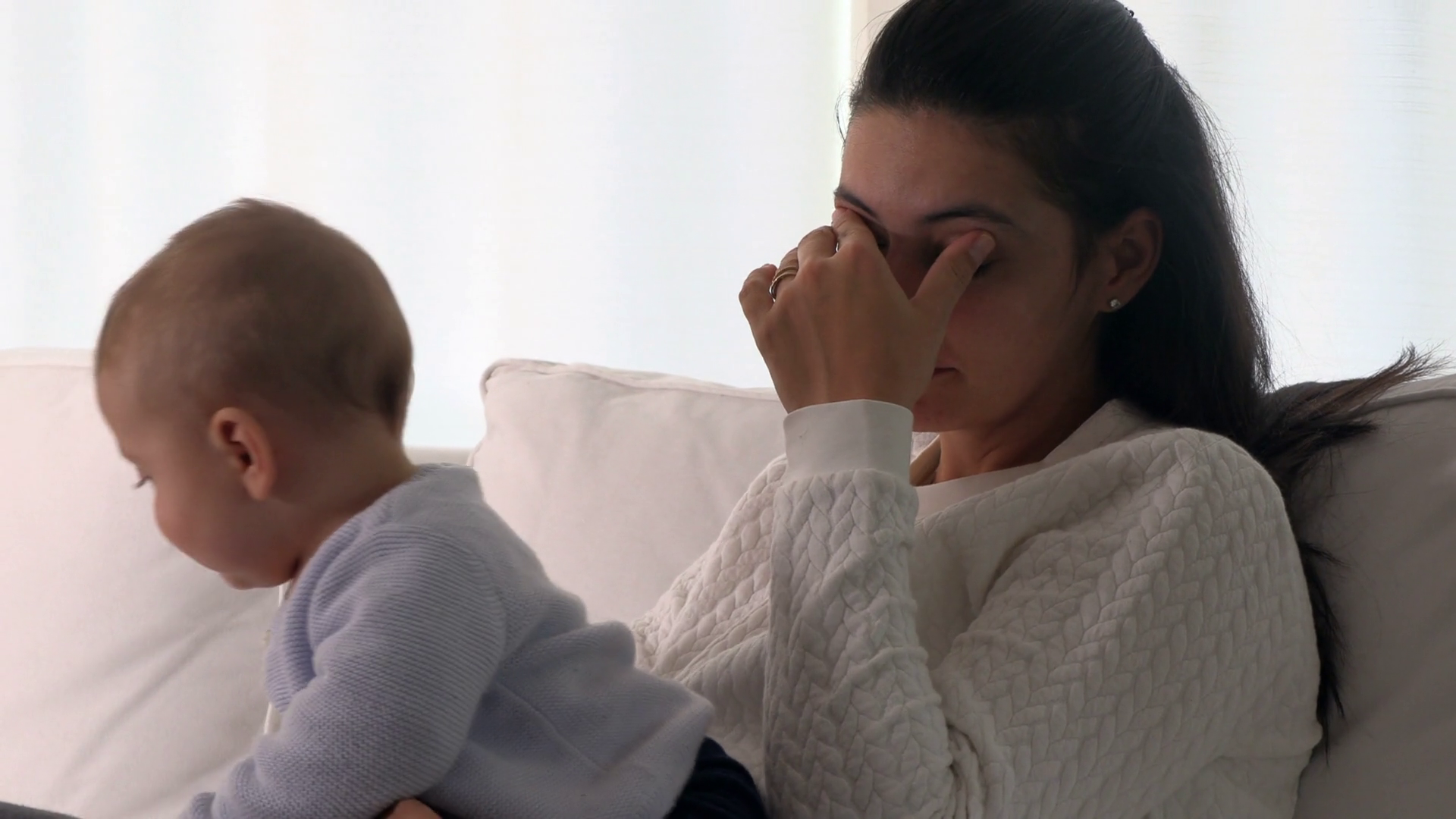 Seeking Rest: Authentic Fatigued Mother Stock Footage SBV-348419828 ...