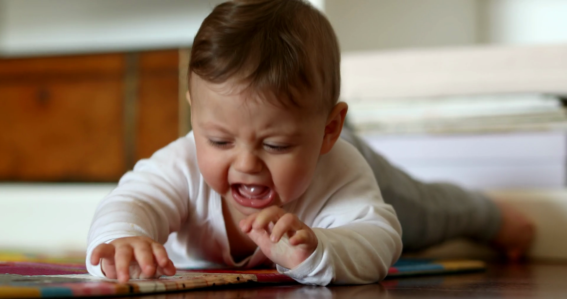 Baby Infant Lying On Floor Starts To Cry Stock Footage SBV-348528783 ...