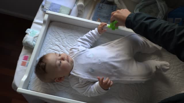Toddler Diaper Change Stock Footage: Royalty-Free Video Clips - Storyblocks