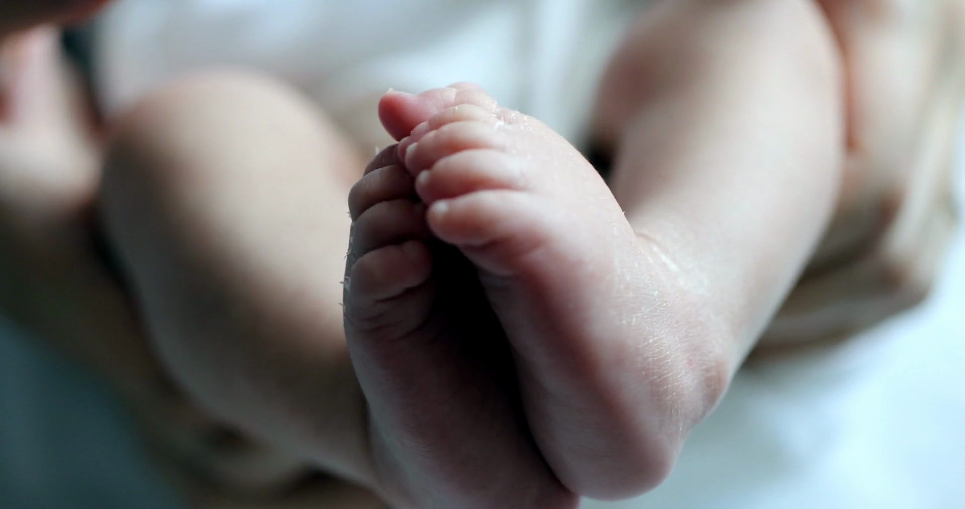 Tiny Togetherness: Baby Newborn's Feet Stock Footage SBV-348428824 ...