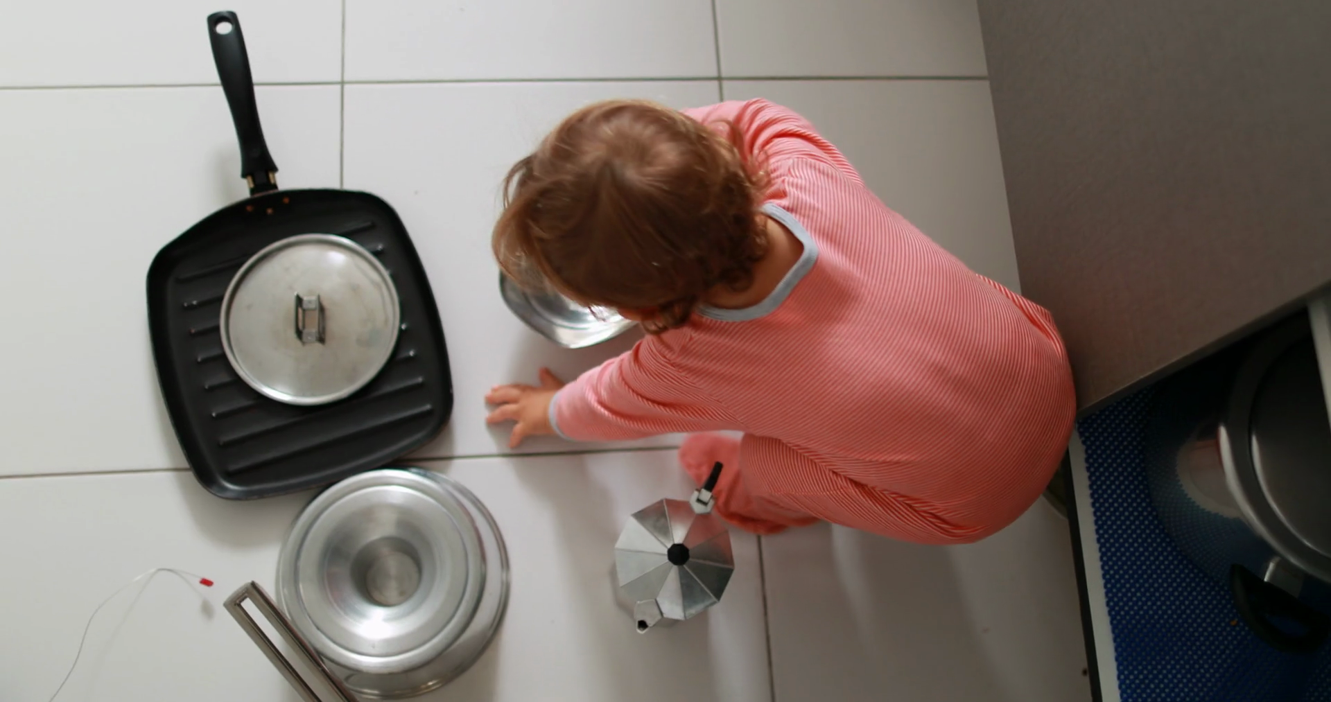 Baby Playing With Pans Pots In Kitchen Floor Stock Footage SBV ...