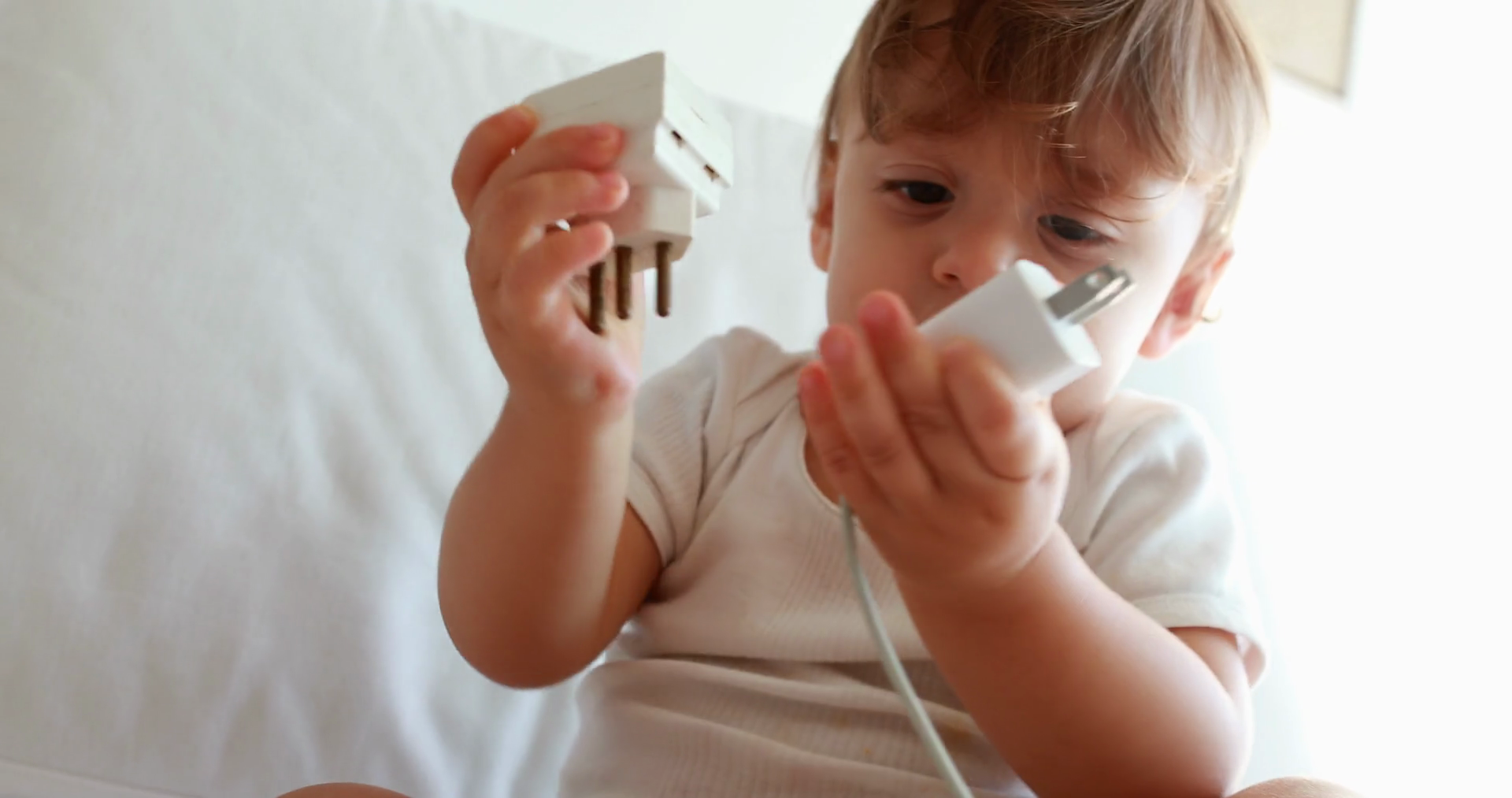 Baby Unplugging Smartphone Charger Cable Stock Footage SBV-348549578 ...