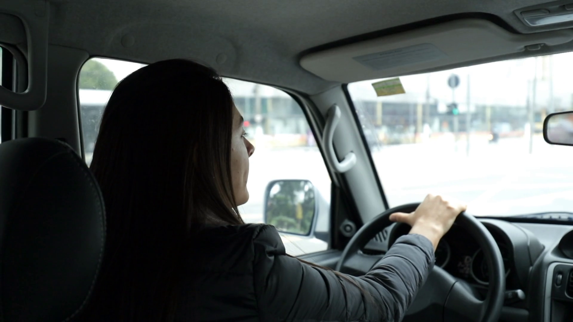 Back Of Female Driver On Road Stock Footage SBV-348498878 - Storyblocks