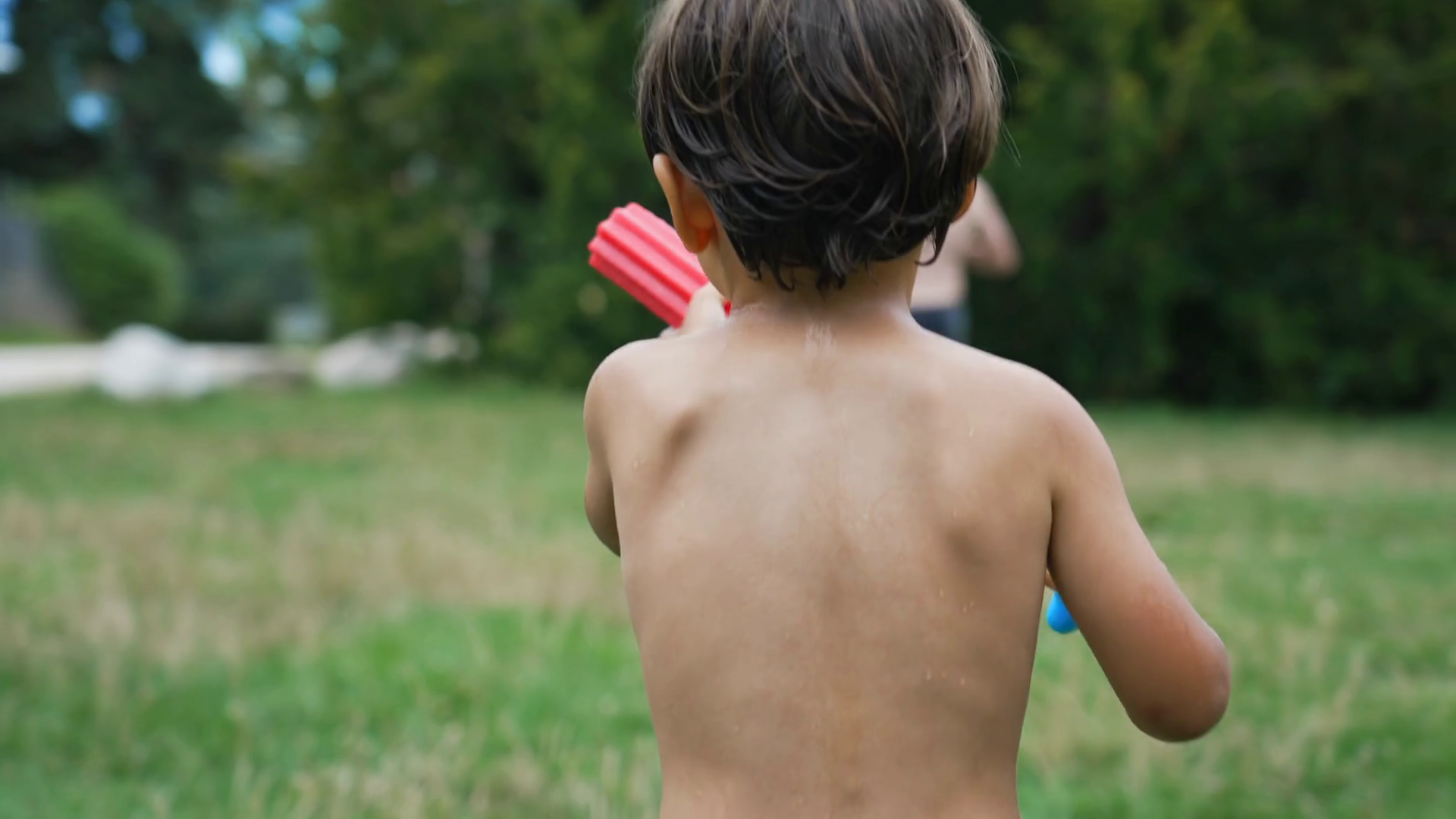 Back Of Child Running Outside In Garden Stock Footage SBV-348896134 ...