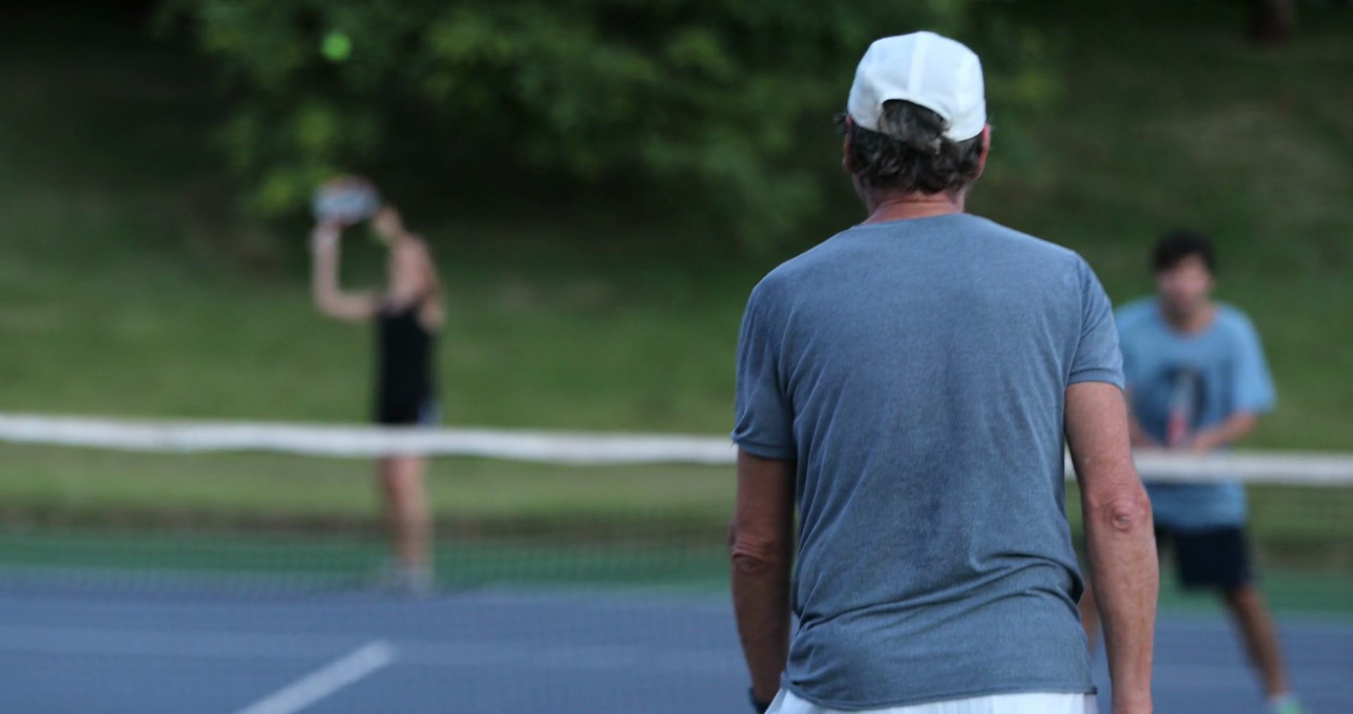 Back Of Older Man Playing Tennis Match Stock Footage SBV-348780544 ...