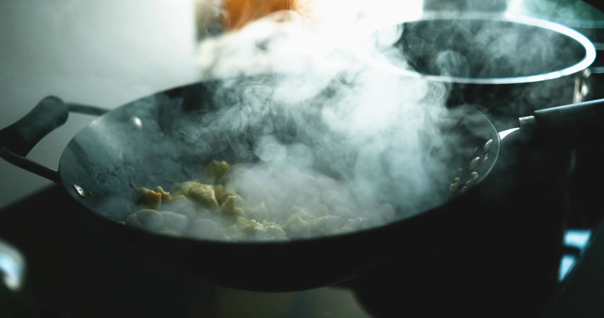 Preparing Chicken In Sizzling Pan Cooking Stock Footage SBV-348635251 ...